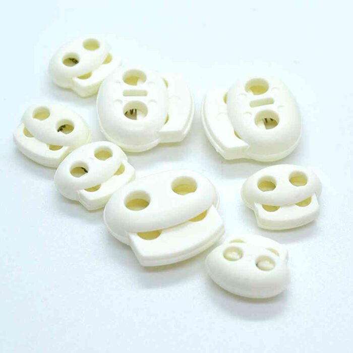 2 HOLE CORD LOCKS SPRING LOADED 18mm 25mm - Nasias Buttons